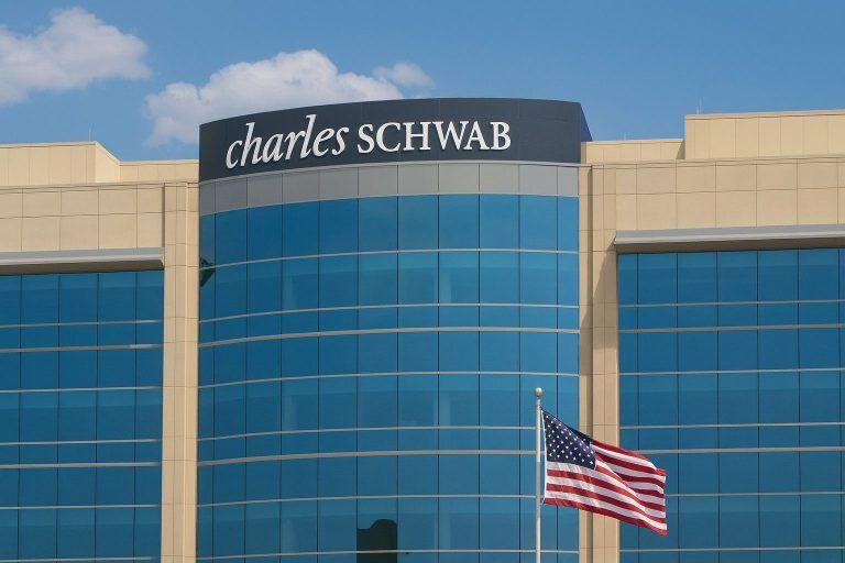 Schwab stock slips as Fed minutes put rate outlook back in focus